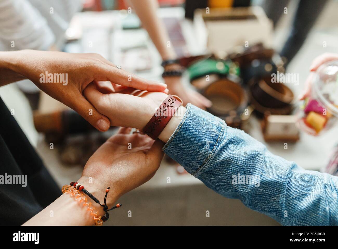 Bracelets gold leather hi-res stock photography and images - Alamy