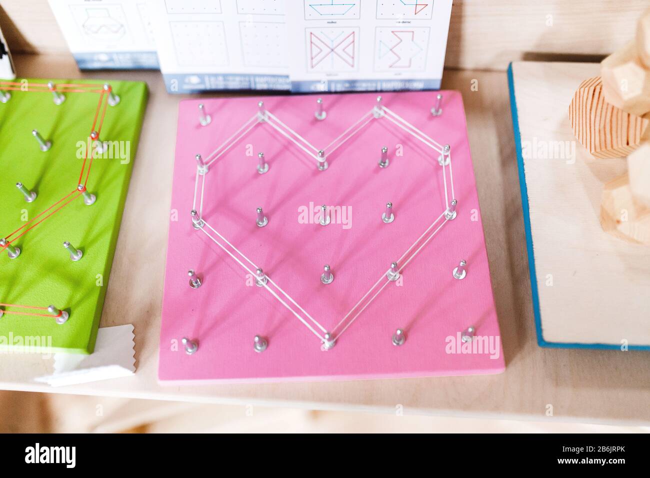 Modern Colorful educational board game for children of pins and rubber ...