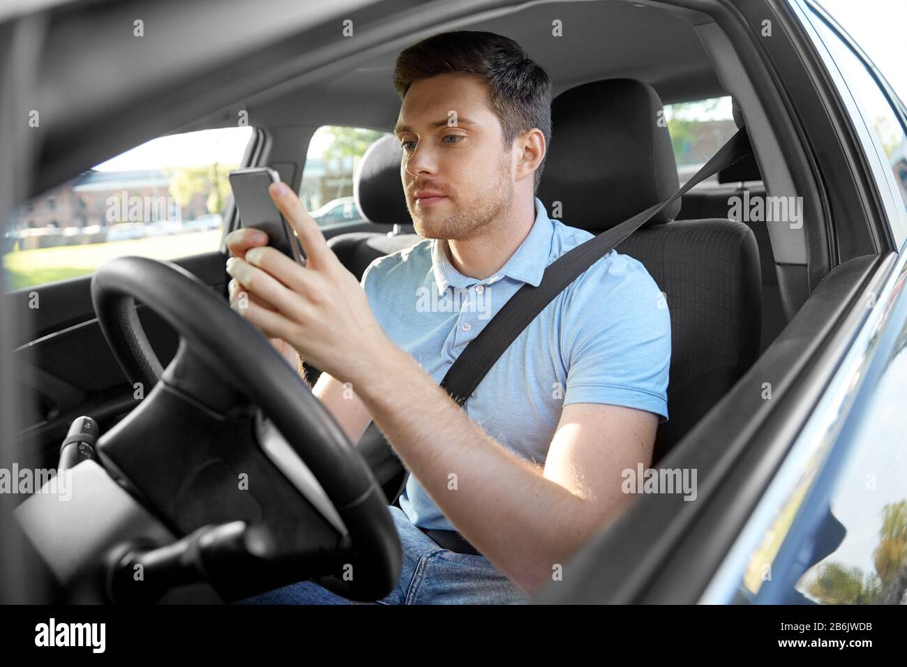 transport, vehicle and technology concept - smiling man or driver ...