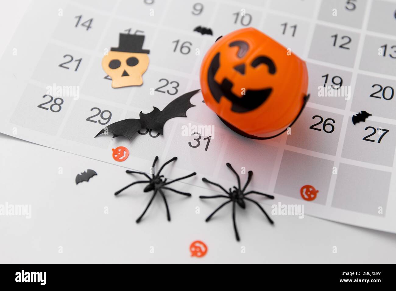 halloween, decorations and holidays concept - jack o lantern, spiders ...
