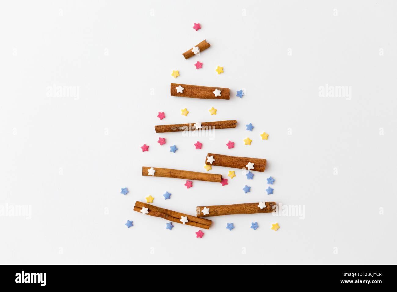 seasonal food, spices and sweets concept - christmas tree made of ...
