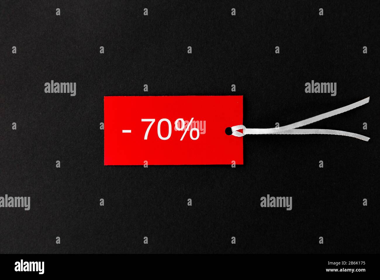 shopping, sale and outlet concept - red tags with discount signs on ...