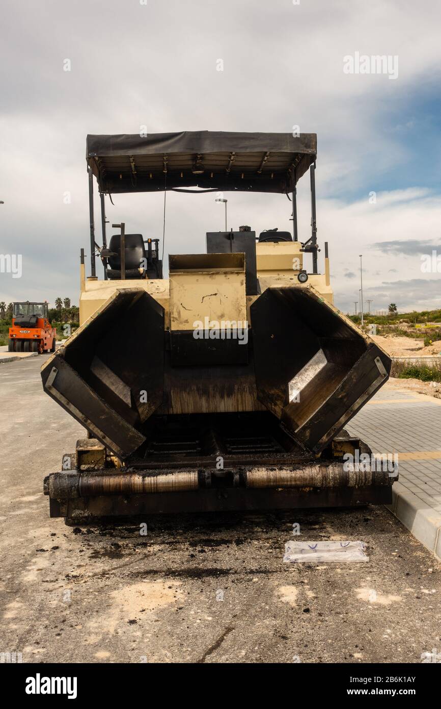 Road laying vehicle Stock Photo - Alamy