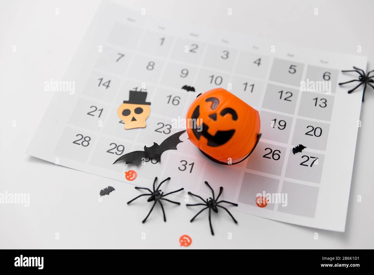 halloween, decorations and holidays concept - jack o lantern, spiders ...