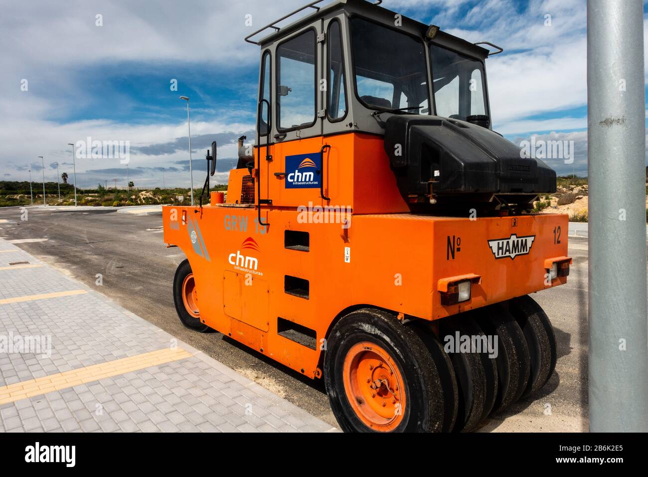Road laying vehicle Stock Photo - Alamy