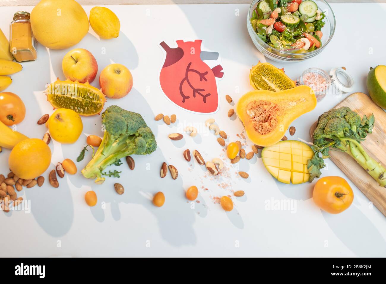 Human heart drawing with variety of healthy fresh fruits and vegetables ...