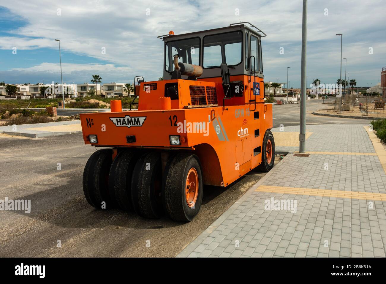 Road laying vehicle Stock Photo - Alamy