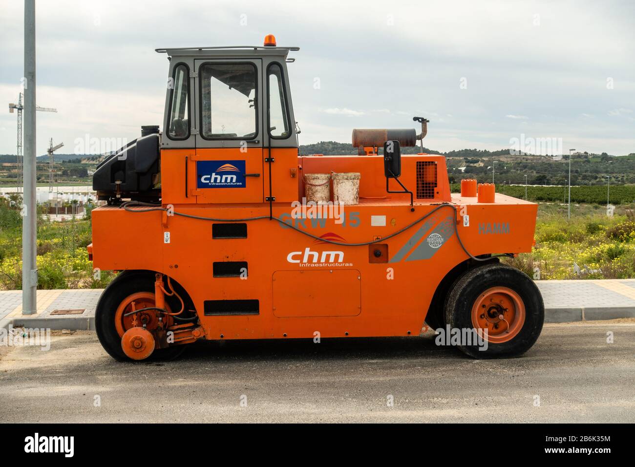 Road laying vehicle Stock Photo - Alamy