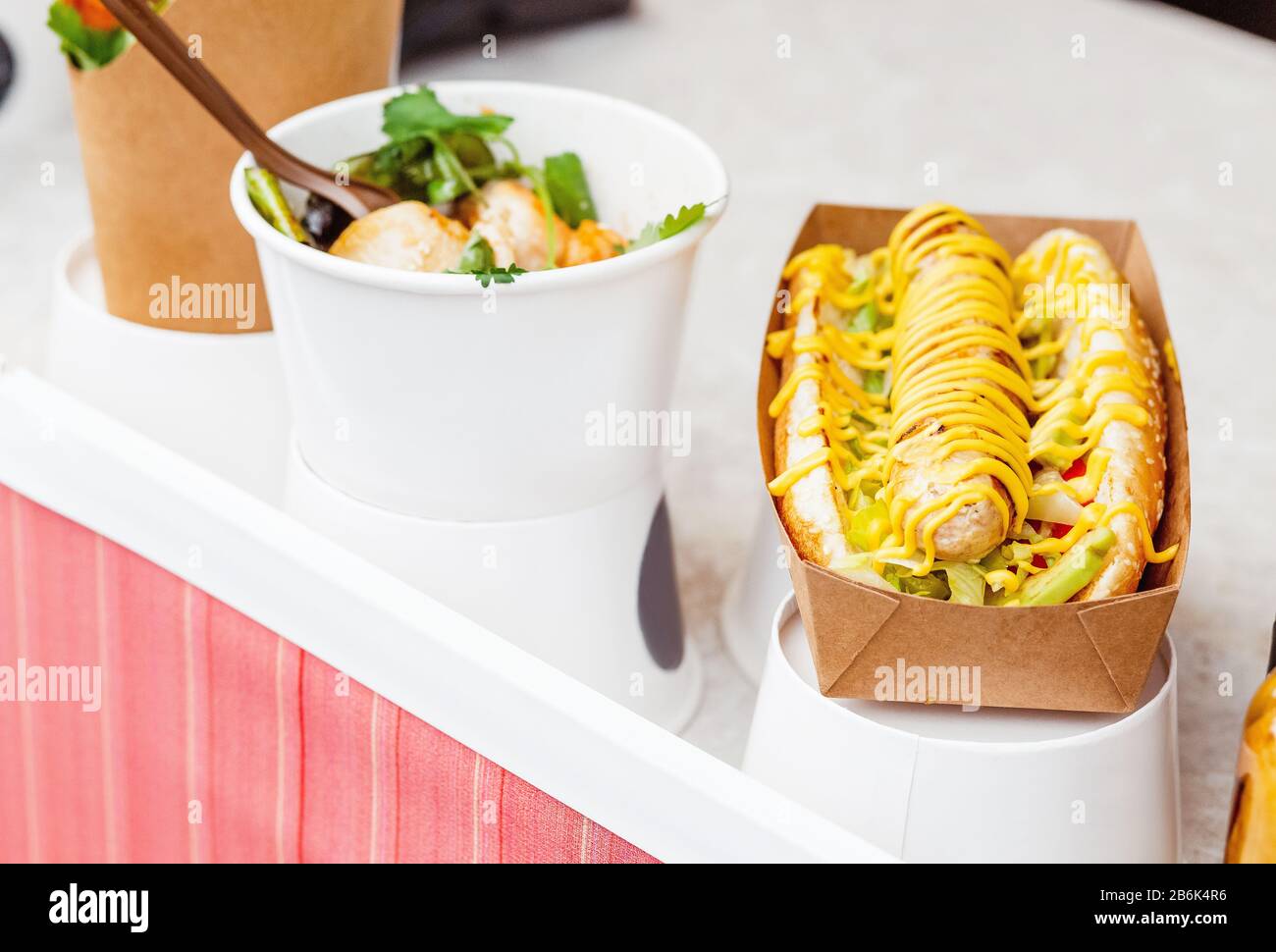 Modern Street food concept. Hotdog with mustard for sale Stock Photo ...