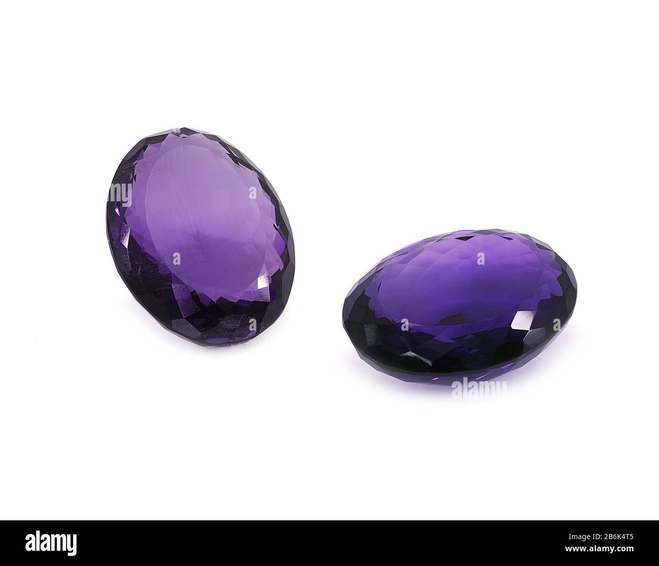 Two beautiful amethysts on a white background Stock Photo - Alamy