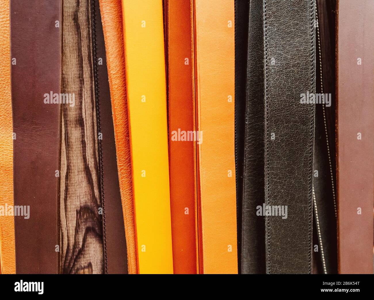 Leather belts as background Stock Photo - Alamy