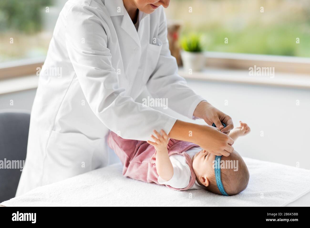 medicine, healthcare and pediatrics concept - female pediatrician ...