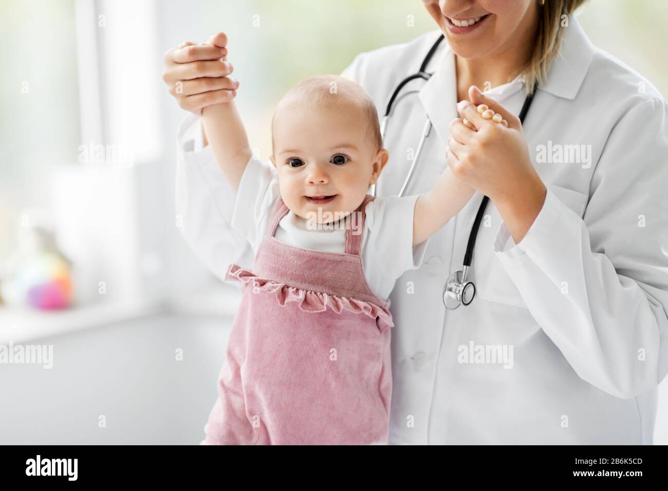 medicine, healthcare and pediatrics concept - female pediatrician or ...