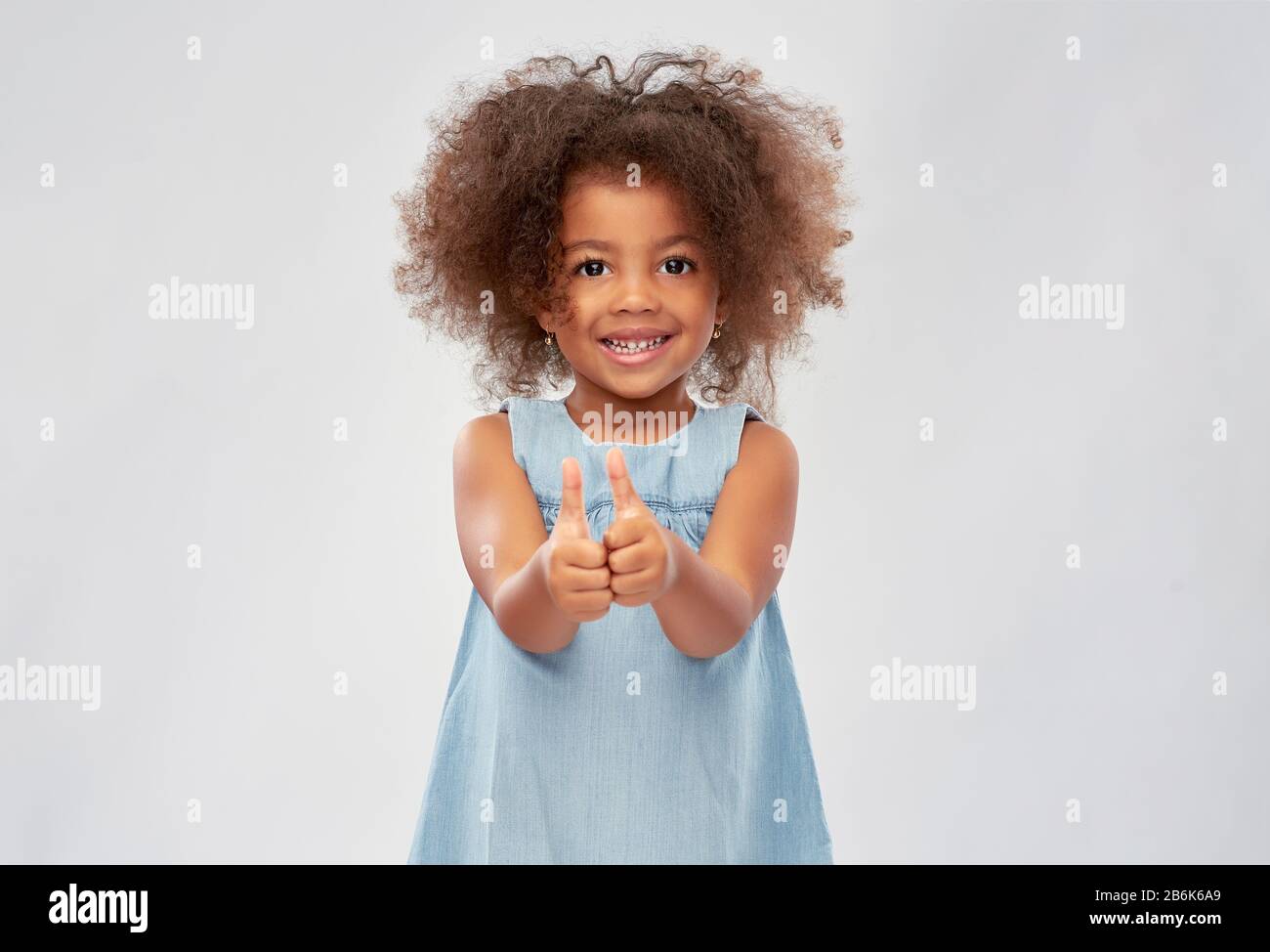 childhood, gesture and people concept - happy little african american ...