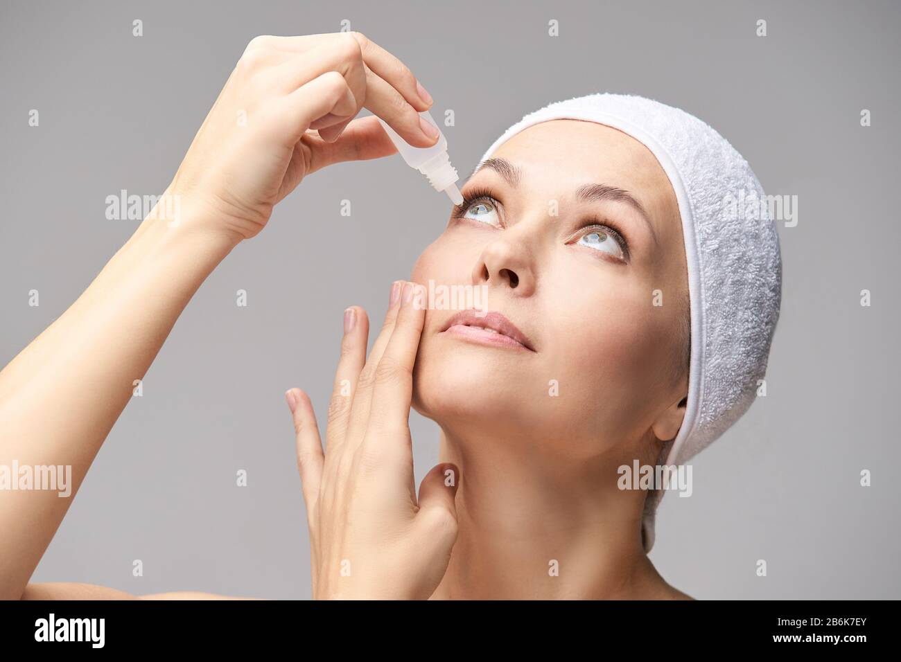 Woman using eye drops. Medicine treatment. Eyecare human problem ...