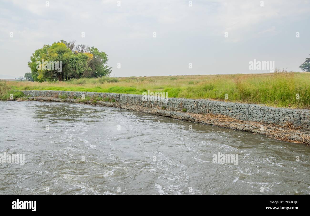 Gabion retaining walls to control erosion and flooding on the banks of ...