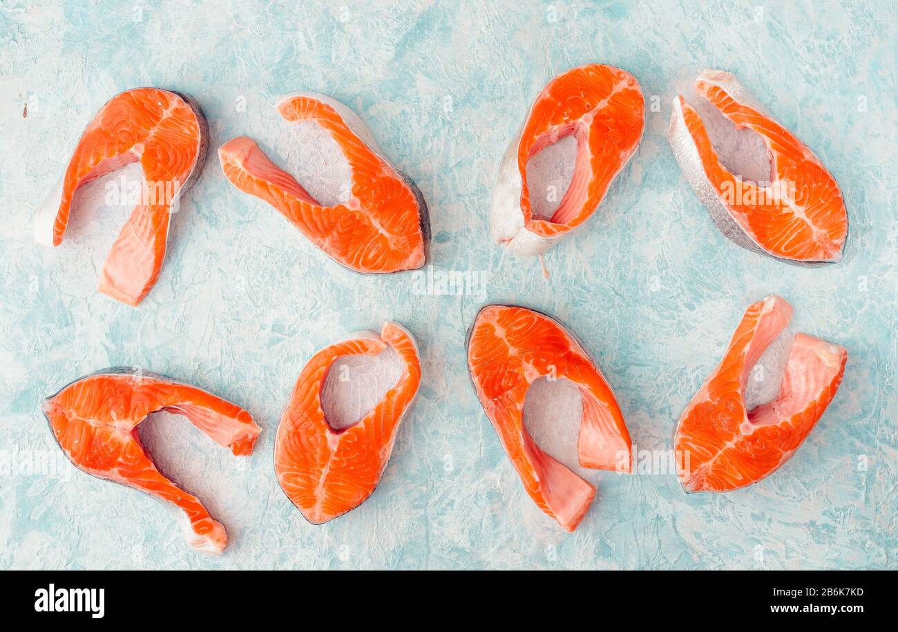 fresh uncooked red fish fillet over white Stock Photo - Alamy