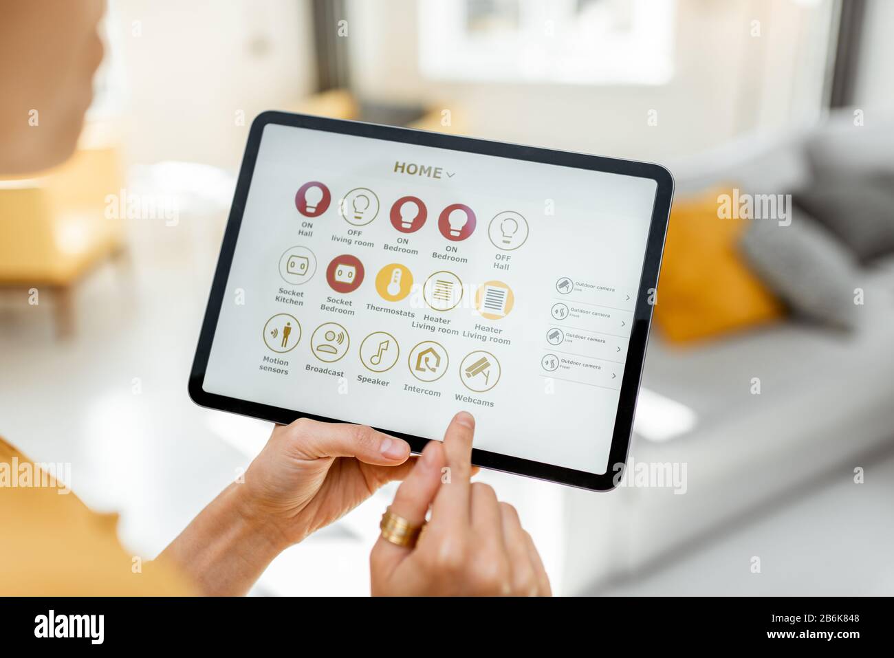 Controlling smart home devices using a digital tablet with launched ...