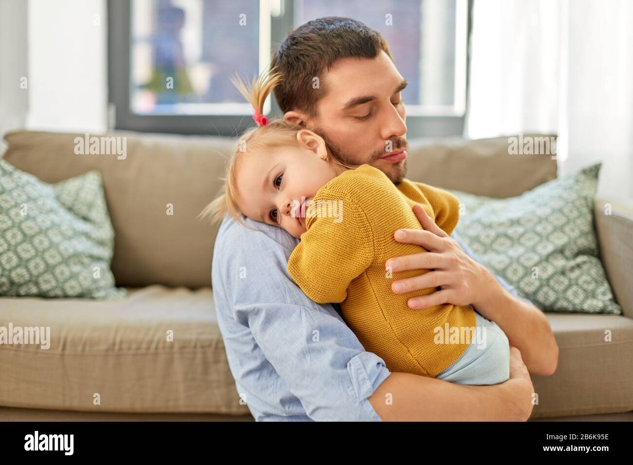 family, parenthood and fatherhood concept - loving father holding ...