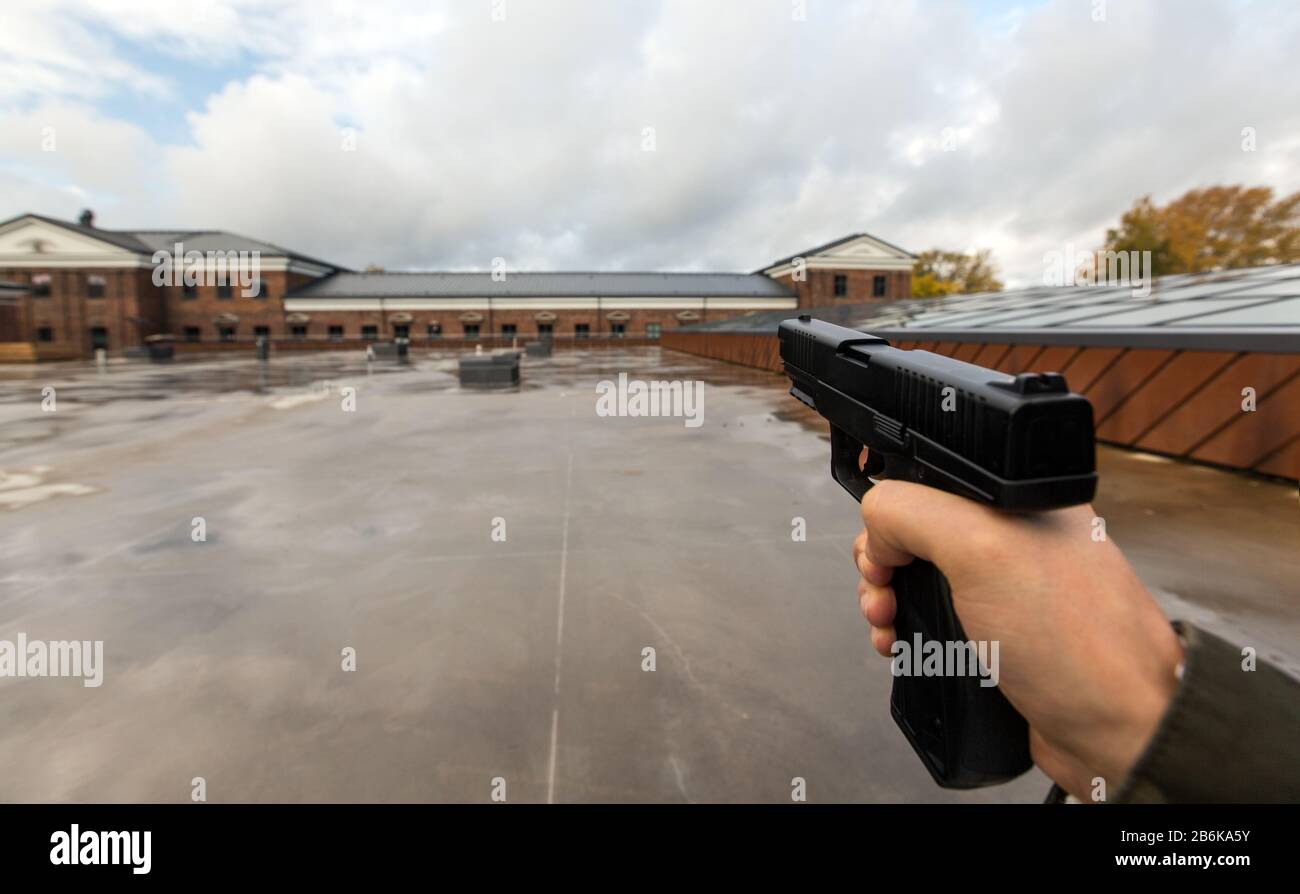 Holding gun first person hi-res stock photography and images - Alamy
