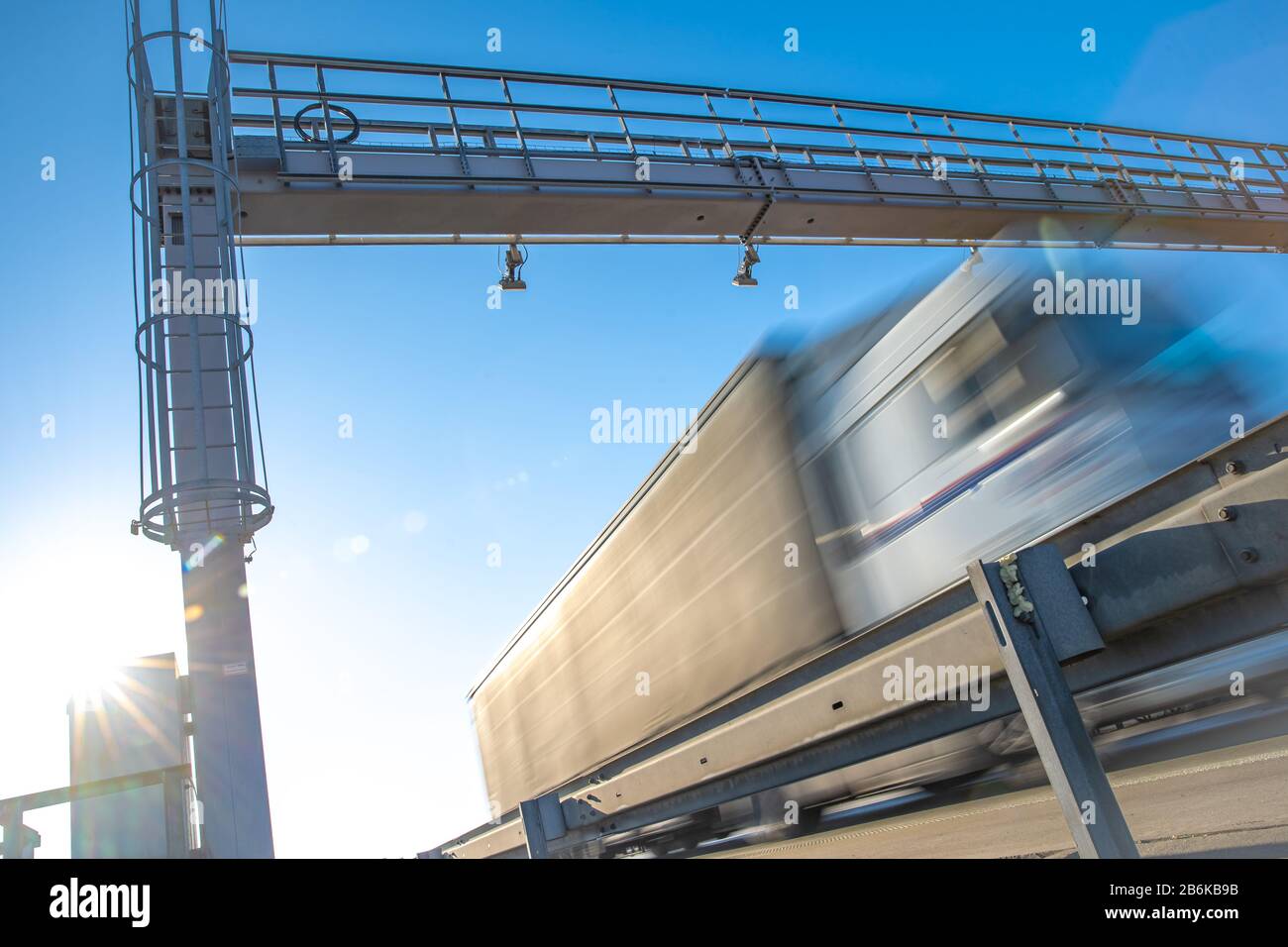truck passing through a toll gate on a highway toll roads Stock Photo ...