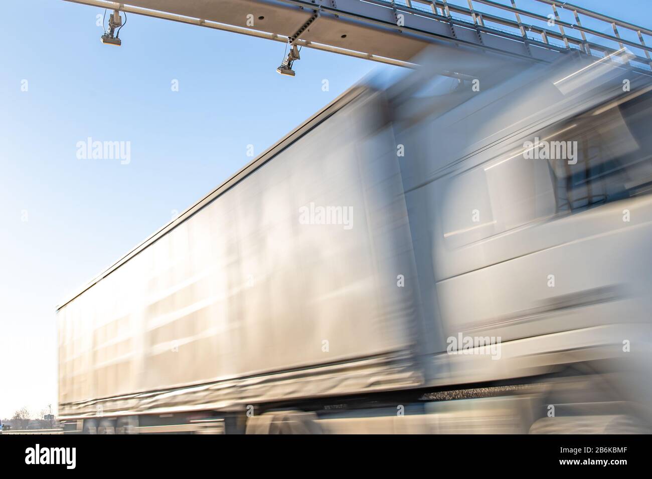 truck passing through a toll gate on a highway toll roads Stock Photo ...