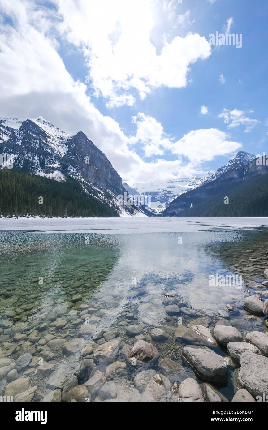 Mount fairview, partly frozen lake, Lake Louise Banff National Park ...