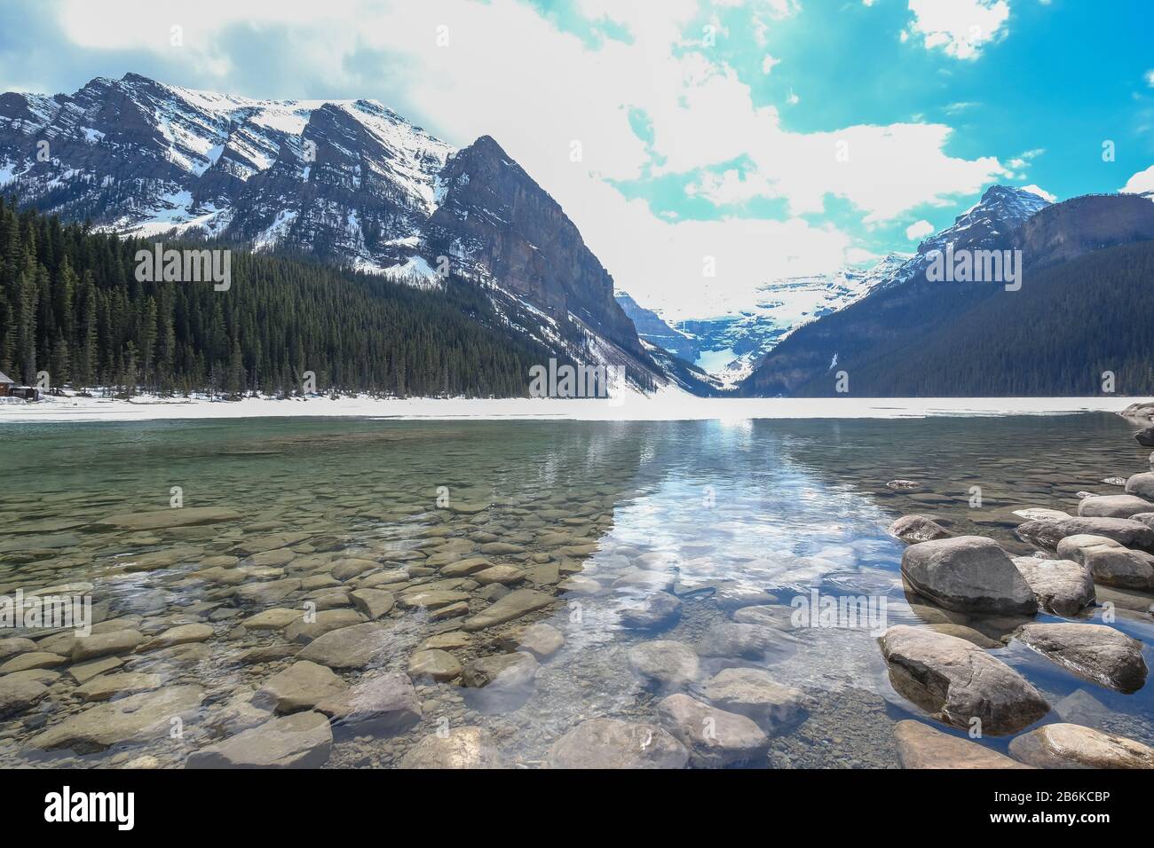 Mount fairview, partly frozen lake, Lake Louise Banff National Park ...