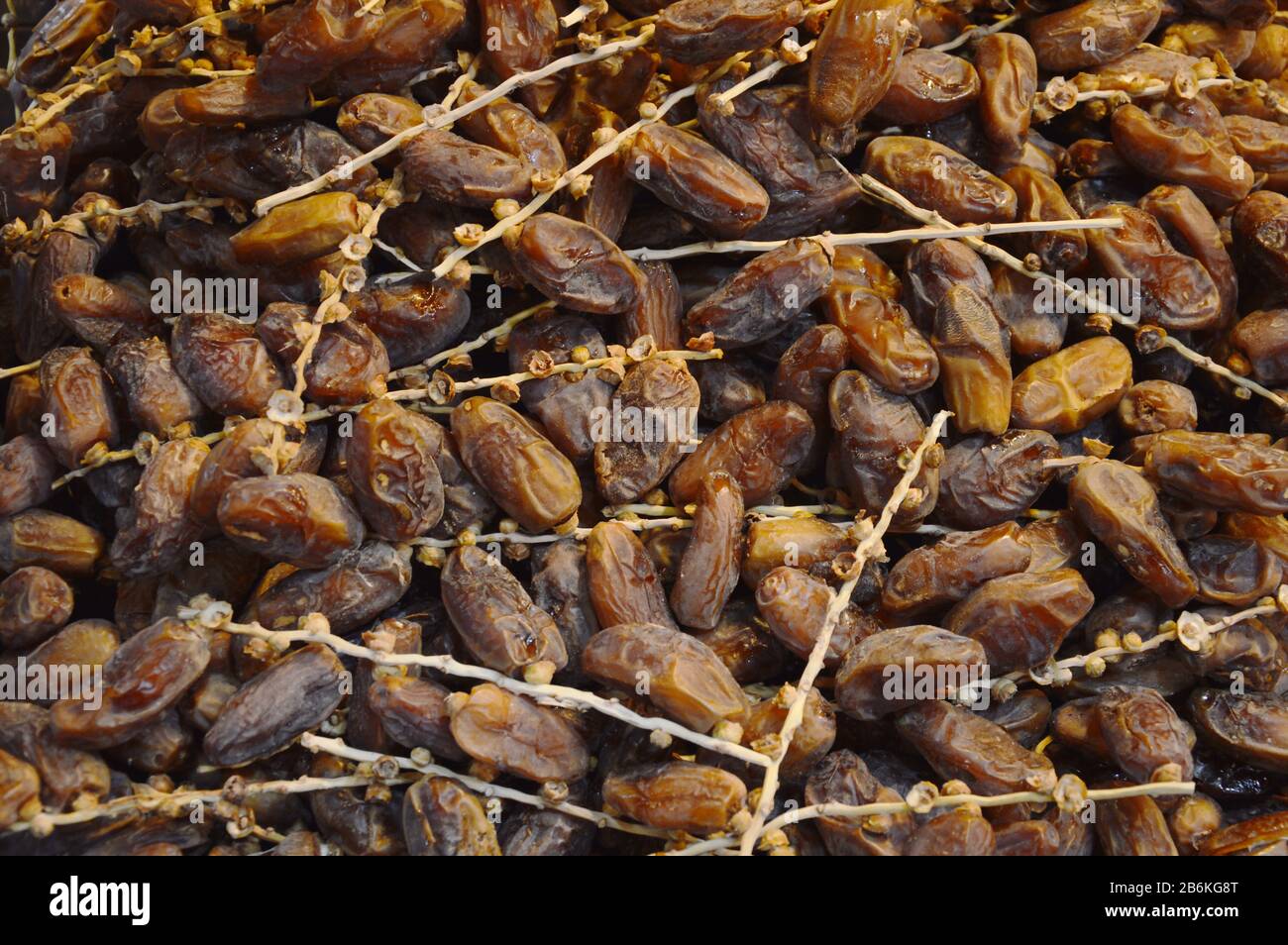 dry date palm preserved fruit in market Stock Photo - Alamy