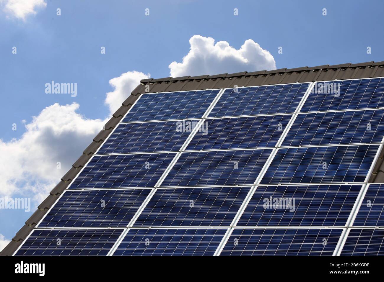 Roof with solar panels Stock Photo - Alamy