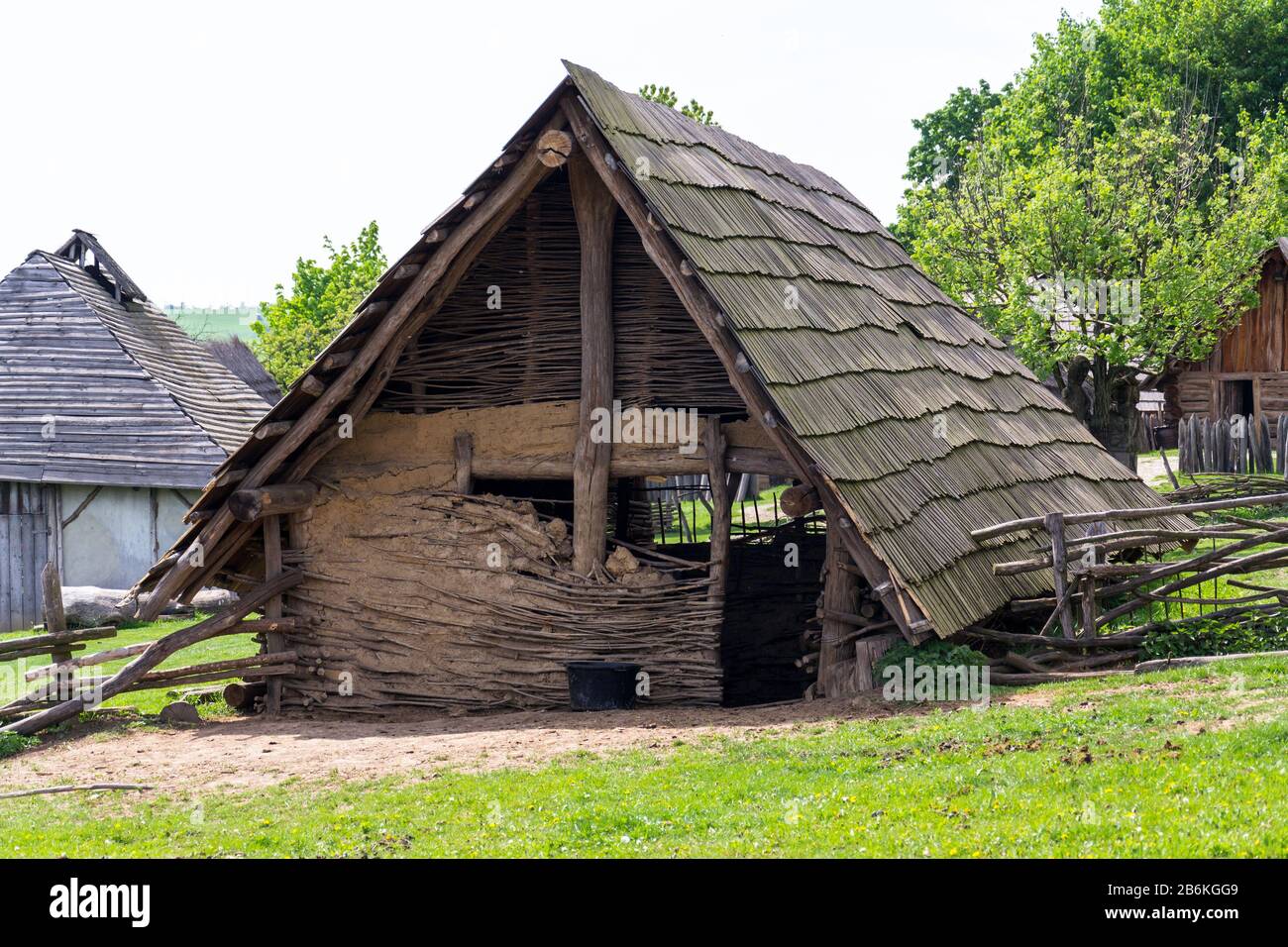Traditional medieval wooden buildings at archaeological heritage ...
