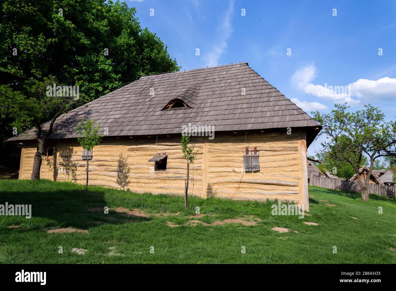 Traditional medieval wooden buildings at archaeological heritage ...
