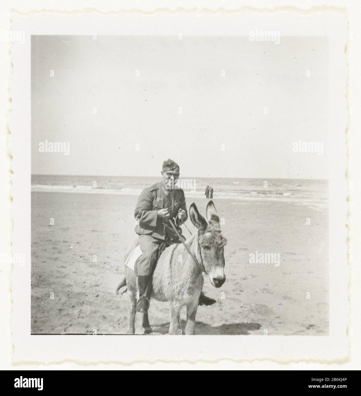 A Wehrmacht soldier riding a donkey A Wehrmacht soldier has his picture ...