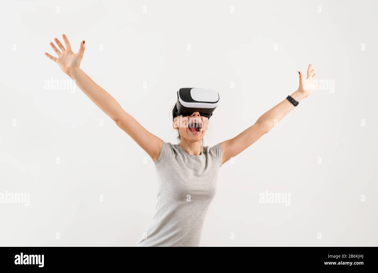 Girl in VR glasses isolated on white background. Extended reality Stock ...