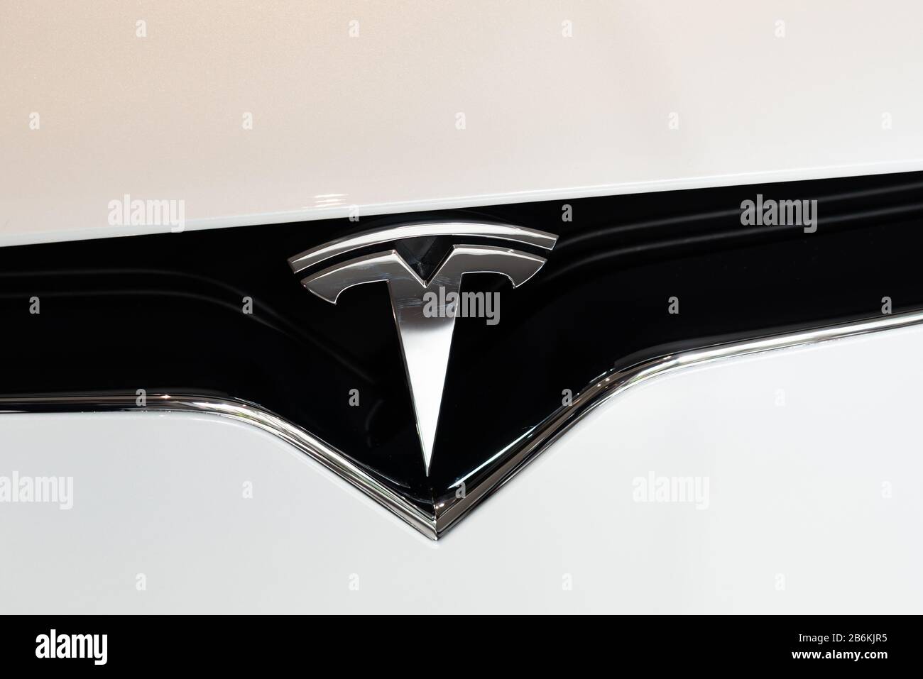 American electric vehicle and clean energy company Tesla logo seen on a ...