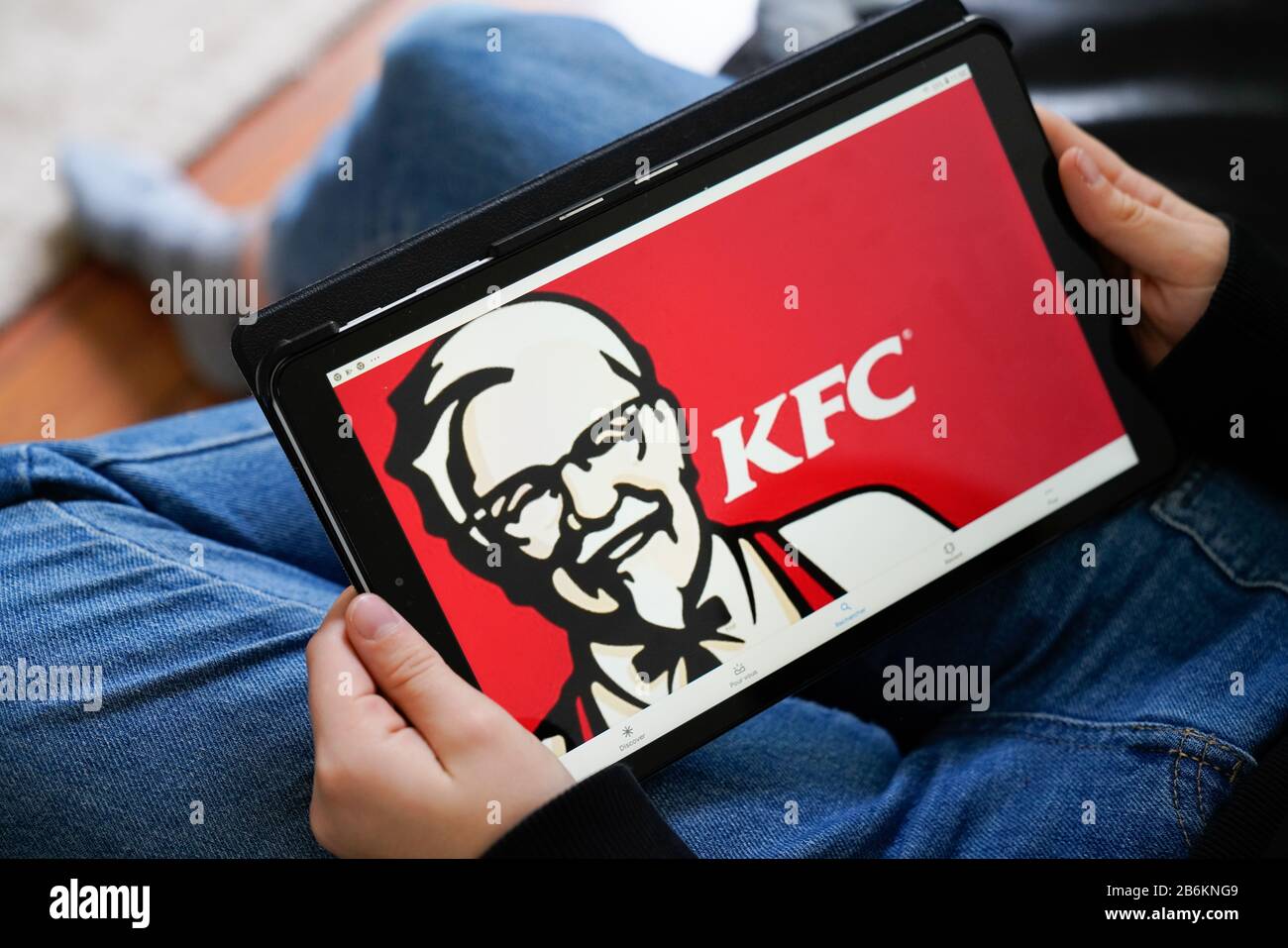 Bordeaux , Aquitaine / France - 12 04 2019 : kfc sign logo On Tablet ...
