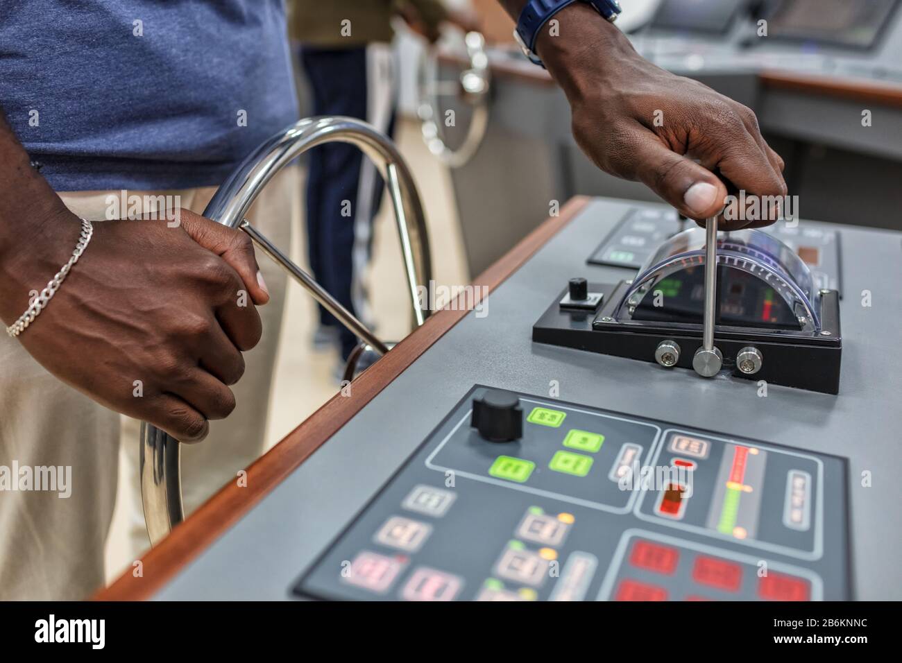 Hands helm boat hi-res stock photography and images - Alamy