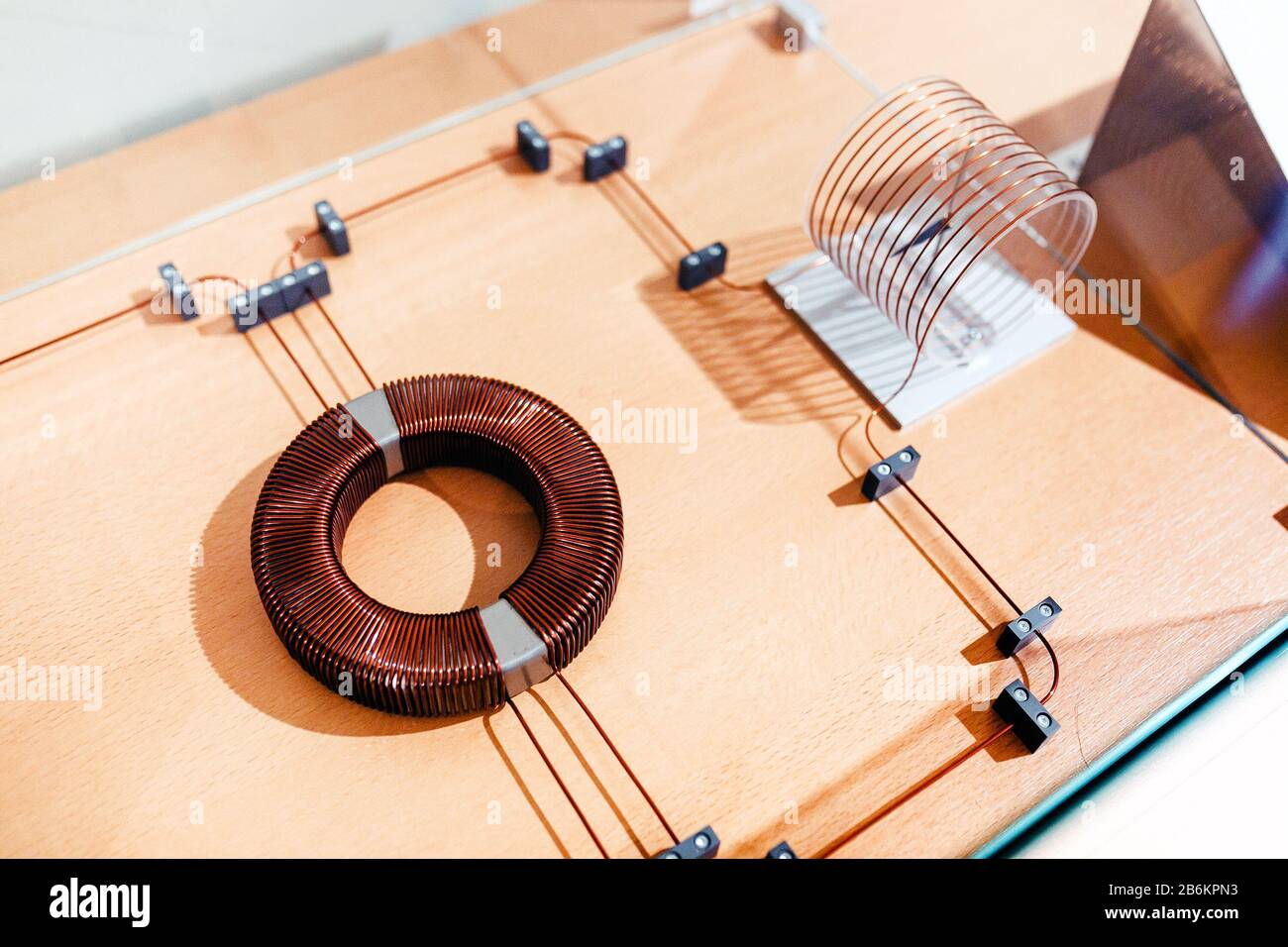 A physical experiment with electricity and a coil inductor Stock Photo ...