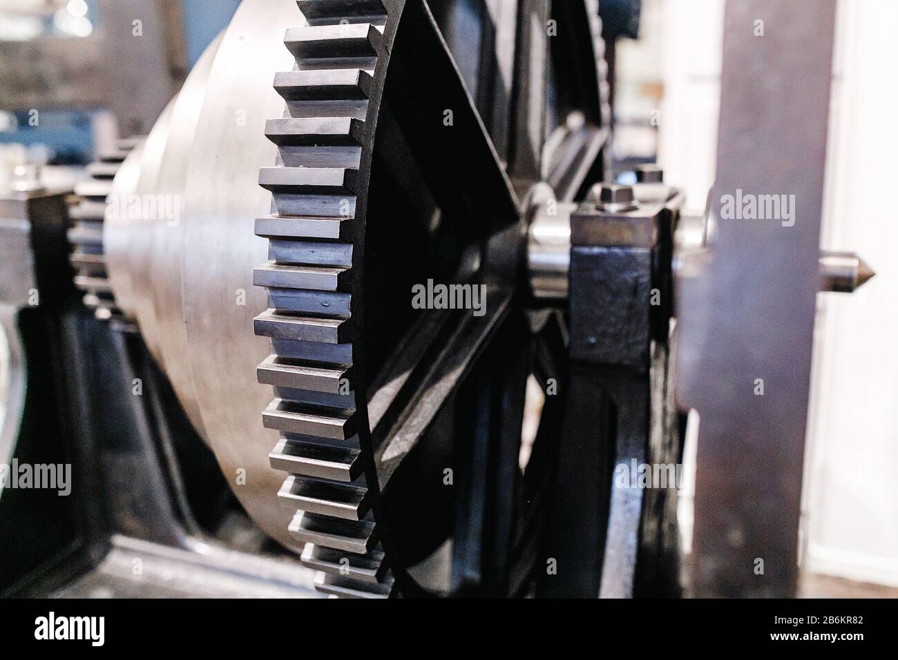 large cogwheel gear in metal machine work shop Stock Photo - Alamy