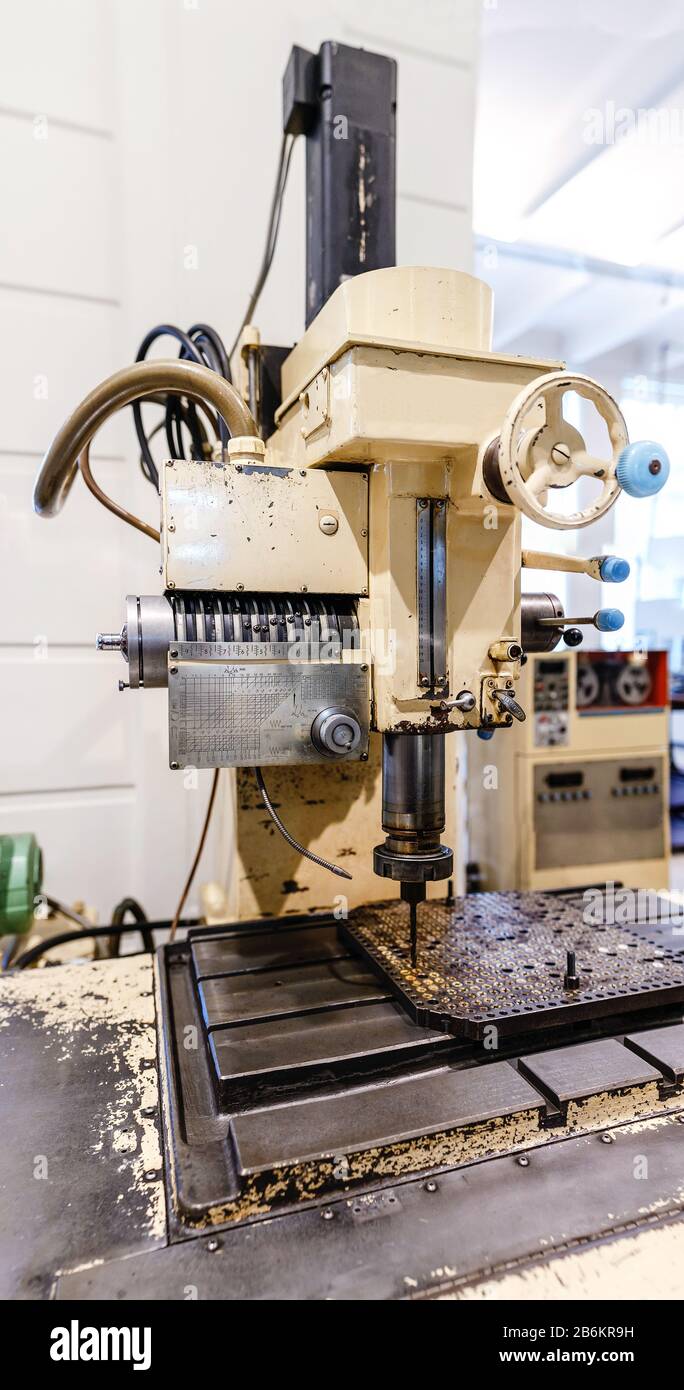 old drilling machine in factory workshop Stock Photo - Alamy