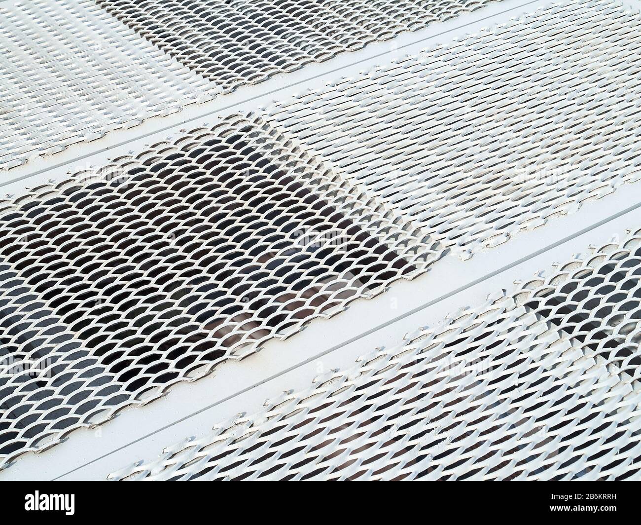 Perforated metal sheet stamping plates texture angled view. Made ...
