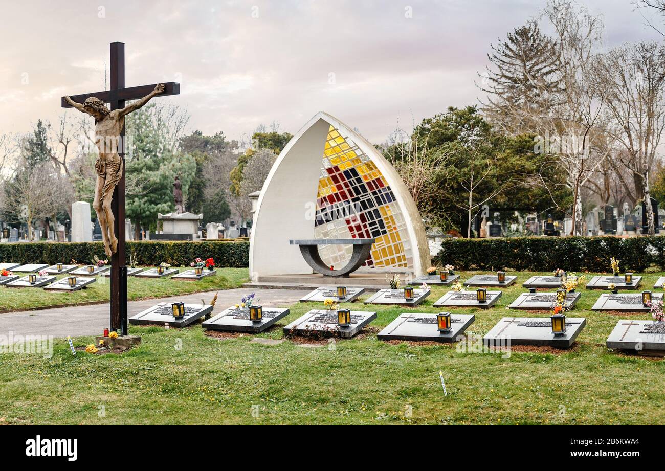 Close up of crucified Jesus on cross at the cemetery memorial gravestone Stock Photo - Alamy