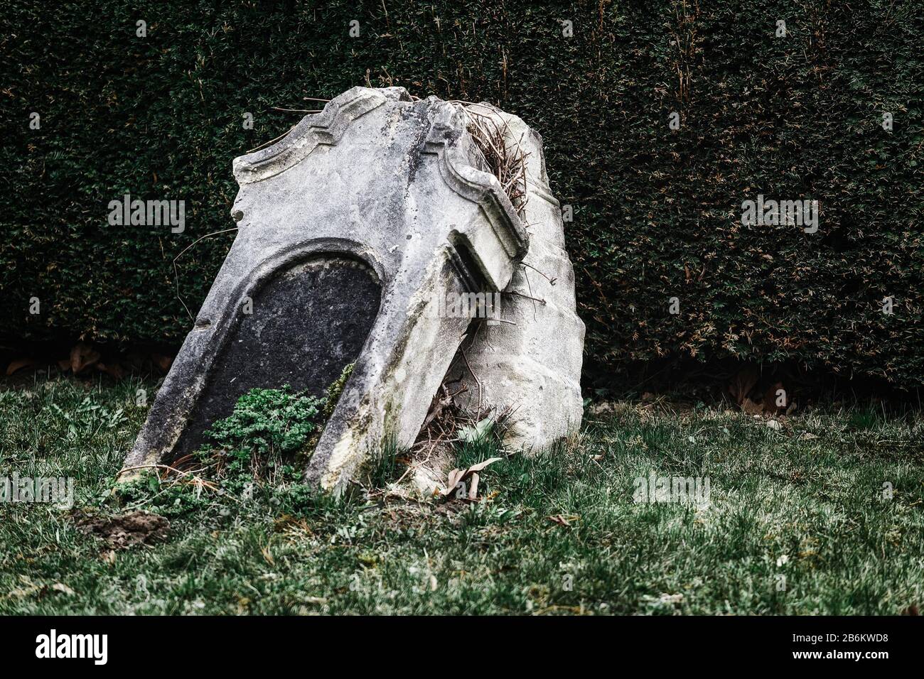 Old ruines Tombstone grave in an ancient church graveyard Stock Photo ...