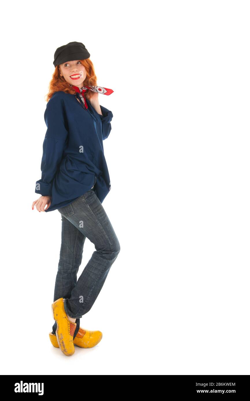 Female Dutch farmer with wooden shoes isolated over white background ...