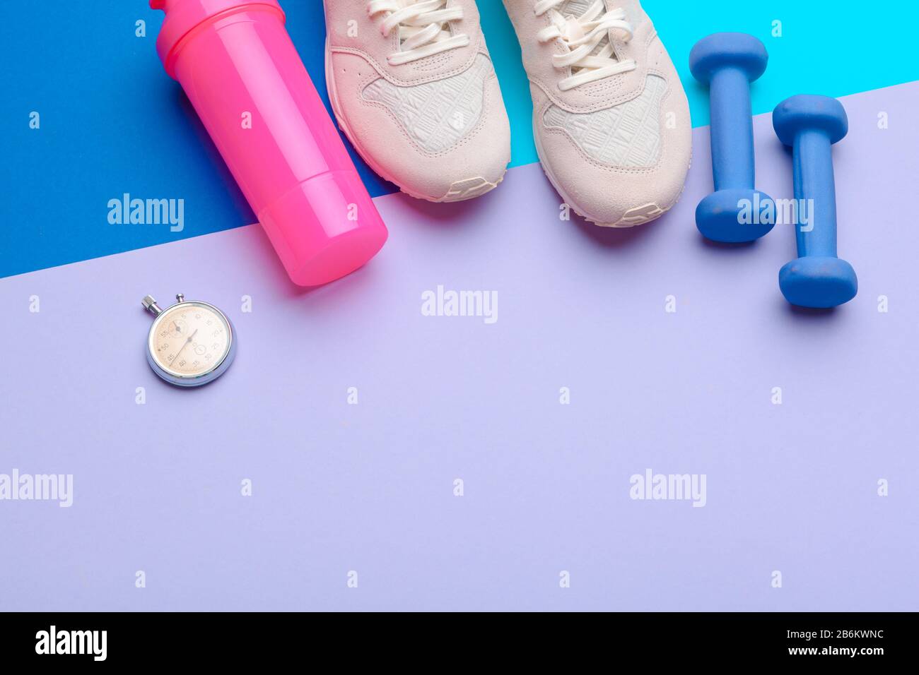 Fitness Gym equipment on color background creative photo Stock Photo ...