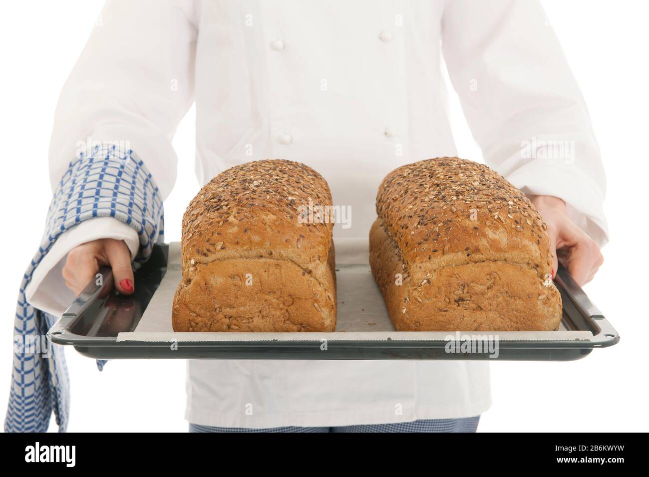 Female baker chef with baked bread isolated over white background Stock ...