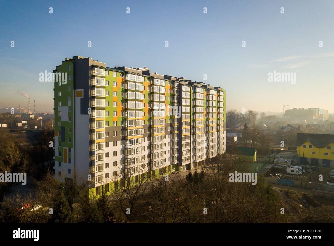 Aerial view of a tall residential apartment building with many windows ... Aerial view of a tall residential apartment building with many windows ...