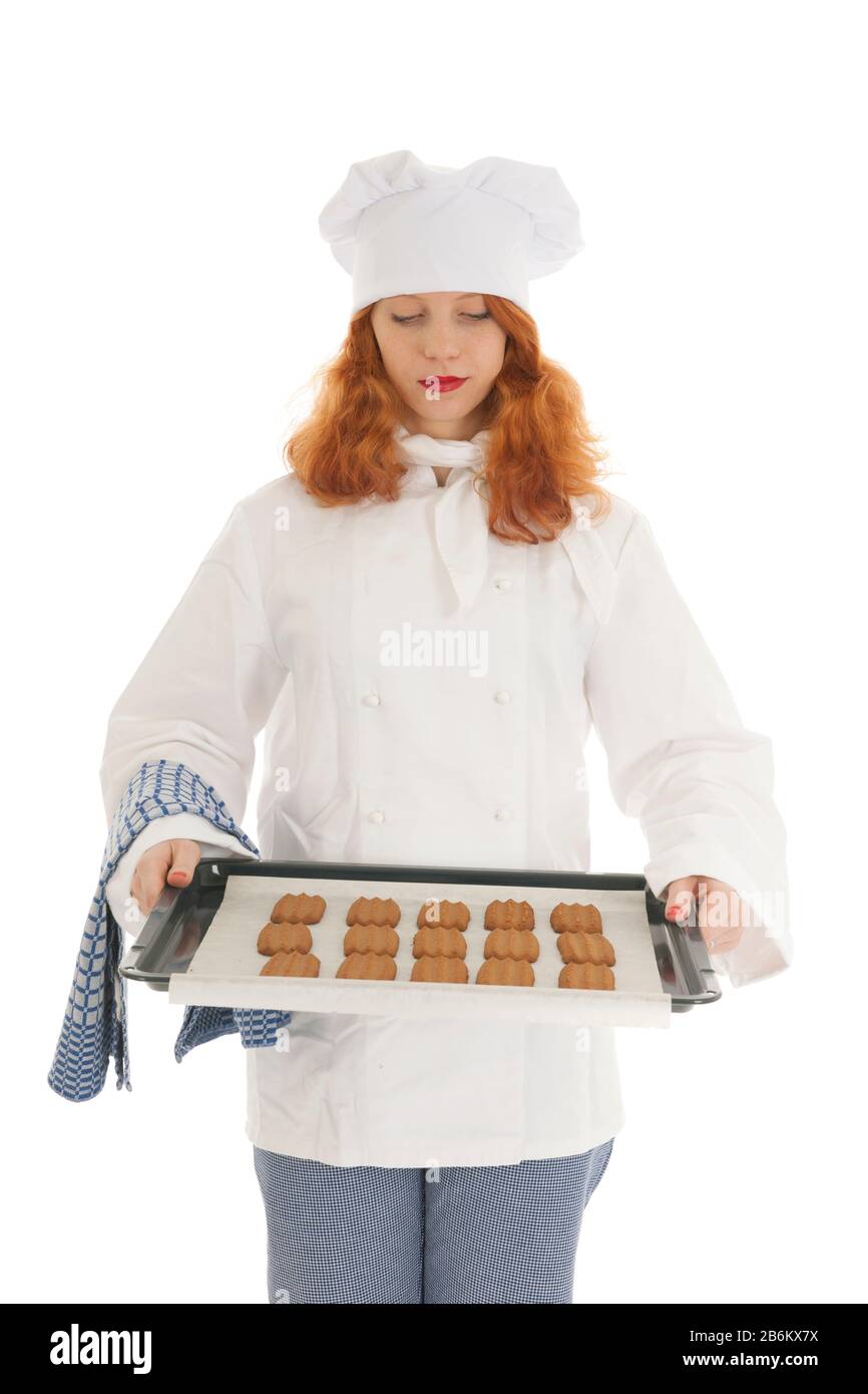 Female baker chef with red hair isolated over white background Stock ...