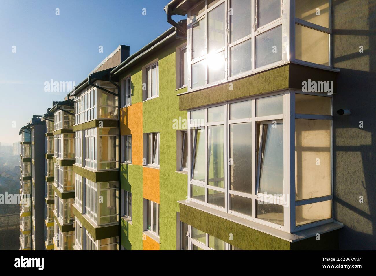 Aerial view of a tall residential apartment building with many windows ...
