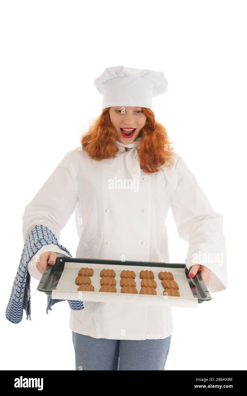 Female baker chef with red hair isolated over white background Stock ...